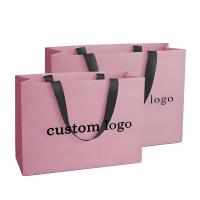 China Arrival Paper Bags Custom Made Accessory Cotton Paper Ribbon Handle Embossing Full Print Paper Bags With Your Own Logo for sale
