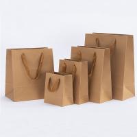 China Custom Luxury Cardboard Packaging Brown Kraft Gift Craft Shopping Paper Bag With Ribbon Handles for sale