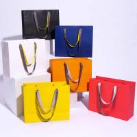 China Handle Reusable Flat Bottom Large Kraft Shopping Paper Bags Logo Printed Paper Bag Custom Made for sale