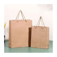 China Hand-Made White Black Recycled Brown Kraft Paper Bag Flexiloop Handle Custom Pink Shopping Bag Your Own Logo Shoes Clothing for sale
