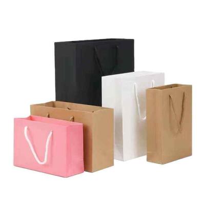 China Manufacture Customized High Quality Printed Paper Bags Low Price With Your Own Logo For Shopping Clothing Shoes And Gift Bags for sale