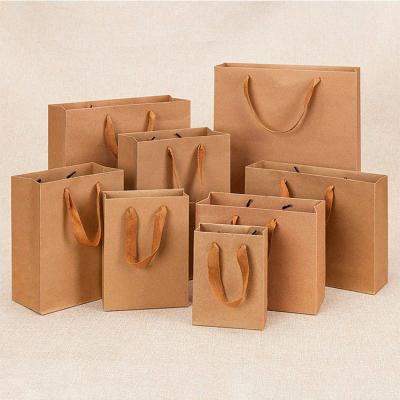 China Manufacture Customized High Quality Printed Paper Bags Low Price With Your Own Logo for sale
