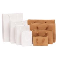 China Kraft Paper Bags With Handles Portable Paper Bag Paper Shopping Bags With Logo for sale