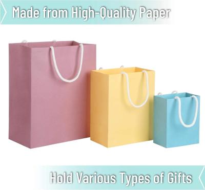 China Coated Paper Handbag Stylish And Durable Eco-Friendly Alternative To Plastic Bags for sale