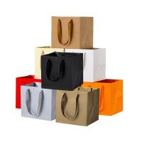 China Square Recyclable Kraft Paper Bag With Handled Design For Candle Packaging Custom Logo Printing Ready for sale