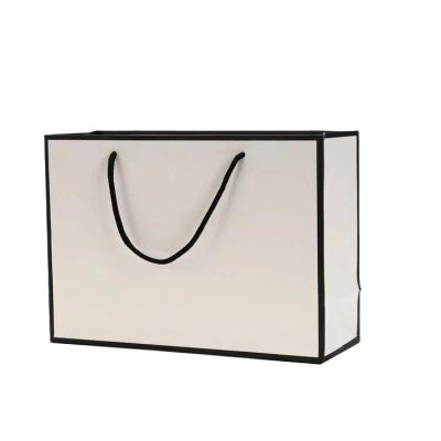 China Customized Custom Wholesale Shopping Making Machine Party Gift Bags White Pink Luxury Paper Bag With Handle For Kids for sale