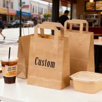 China Custom Logo Brown Kraft Paper Bags Cheap Flat Handle Bags With Sticker Seal For Crafts & Retail Packaging for sale