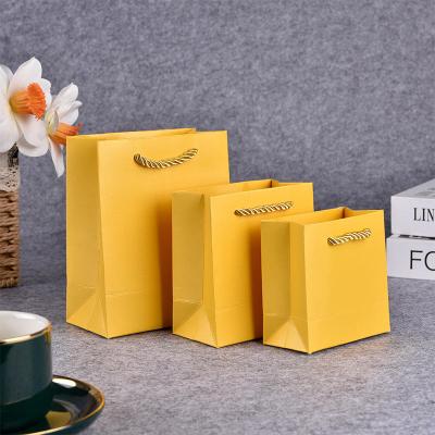 China Brown Kraft Paper Bag With Handle Hot Selling Recycled Shopping Bag For Supermarket Use Customizable Your Own Logo for sale