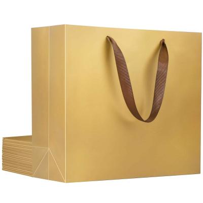 China Eco-Friendly Custom Logo Kraft Paper Bag For Clothing Gift Bag Paper Shopping Bag for sale