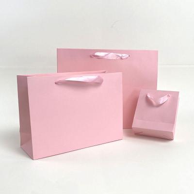 China Custom Design Black White Handles Luxury With Your Own Logo Clothing Shoes Gift Paper Bag With Handle Brown Bags for sale