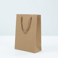China Kraft Paper Bag Logo Printed Biodegradable Packing Brown Kraft Paper Bag With Handles for sale