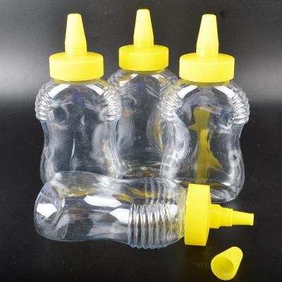 China Food Grade PET Plastic Honey Bottle with Sharp Nipple Mouth 300ml 350ml 500ml for sale