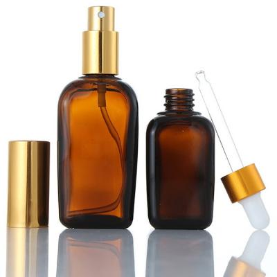 China Custom Square Glass Bottle 20ml 50ml Emulsion Lotion Travel Set Brown Glass Bottles for sale