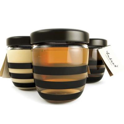 China Empty Glass Honey Jars 20ml to 1000ml Customizable Round Honey Storage Bottles for sale