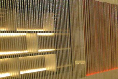 China Spiral Metal Curtain Wall Architectural Wire Mesh - 0.9-3.0mm Wire Diameter, Up to 8m Width, Bronze Herringbone Pattern for sale