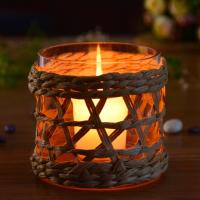 China Round Creative Glass Candle Holders With Wicker Sleeve for sale