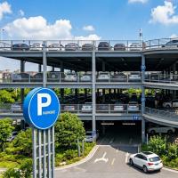 China Multi Level Prefabricated Steel Parking Structure Customized Steel Frame Car Park for sale