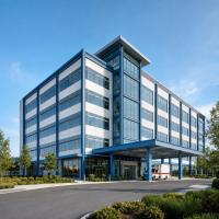 China Sustainable Steel Frame Commercial Building Steel Structure Complex for sale