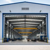 China Clear Span Prefabricated Workshop Buildings Column Free Production Steel Framed Workshop for sale