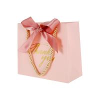 China Rigid Boxes Custom Logo Clothing Packaging Deluxe Paper Bags with Handles for sale