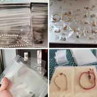 China Zipper Top Sealing Small Jewelry Bags with Custom Logo Thick Clear Plastic Earring Bags for sale