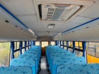 China Primary School Students' Ideal Transportation Used School Bus with Manual Transmission for sale