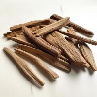 China Earthy Scent Profile Agarwood Chips Aromatic Raw Ingredients for sale