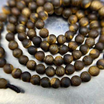 China Handcrafted Agarwood Beads Ideal for Meditation Jewelry and Spiritual Energy Enhancement Purposes for sale
