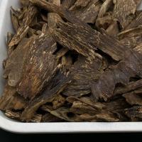 China High grade OUD Agarwood natural fragrant wood chips used in perfume incense and traditional aromatic product manufacturing for sale