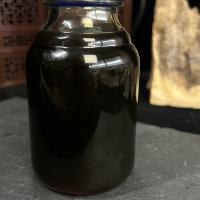 China Ancient Water Distilled Fire Eye Slice Agarwood Oil for sale