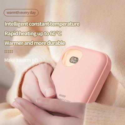 China Custom Usb Rechargeable Pocket Hand Warmer With 2000mAh Battery Winter Warmth for sale