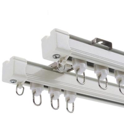 China 20 Feet Sticky Ceiling Wall Mounting No Drill Aluminium Curtain Rail Track With Adhesive Tape for sale