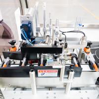 China Horizontal Automatic Shrink Sleeve Labeling Machine Small Products Packaging Machine for sale