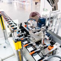 China Horizontal Automatic Shrink Sleeve Labeling Machine Small Products Packaging Machine for sale