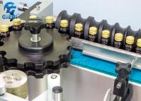 China Double Head Rotary Labeling Machine For 10-50mm Diameter Glass Bottles for sale