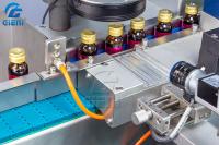 China Double Head Rotary Labeling Machine For 10-50mm Diameter Glass Bottles for sale