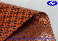 China Orange Polyurethane Leather Fabric with Carbon Kevlar Hybrid - 220 g/m² Weight, 0.66 mm Thickness for Sports Equipment for sale