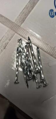 China Angular Spiral Concrete Nails 3/4-6 Inch Carbon Steel 53-57 HRC Galvanized Box Packing for sale
