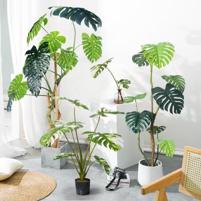China Artificial green monstera home deco hotel office potted tree for sale
