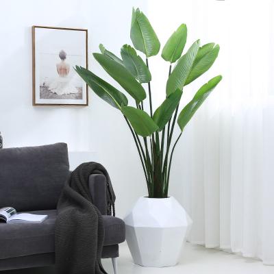 China Indoor Bonsai Artificial Landing Plant Simulated Green Tropical Traveler Palm for sale