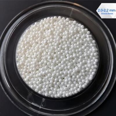 China 2.0 - 2.2mm / 2.2 - 2.4mm Zirconium Oxide Balls , Sphere Zirconia Sintering Beads for sale