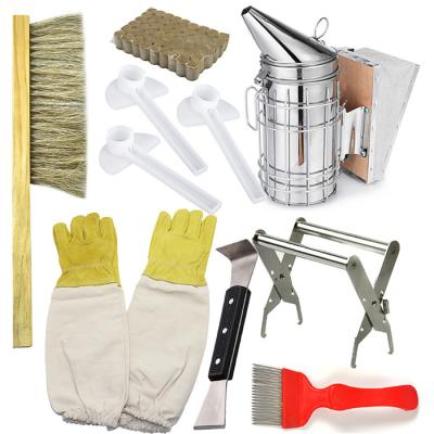 China Beekeeping tools Bee utensils Smoker for bees Smoke bombs Honey cutting fork Bee brush Spleen lifter for sale