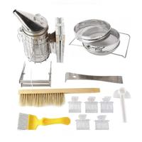 China New beekeeping set beekeeping 12-piece set of smoker water feeder cut honey fork plastic king trap bee clip for sale