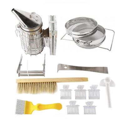 China New beekeeping set beekeeping 12-piece set of smoker water feeder cut honey fork plastic king trap bee clip for sale