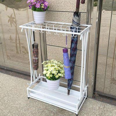 China Hotel Hall 10 Slots 21 Slots Umbrella Storage Stand Multi Purpose Metal Umbrella Holder for sale