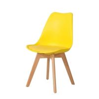 China Yellow Upholstered Leather Dining Chairs PP Plastic Modern Dining Chairs With Wood Legs for sale