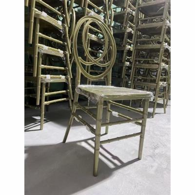 China Luxury Stackable Events Wedding Banquet Dining Chairs PP Gold Phoenix Hotel for sale