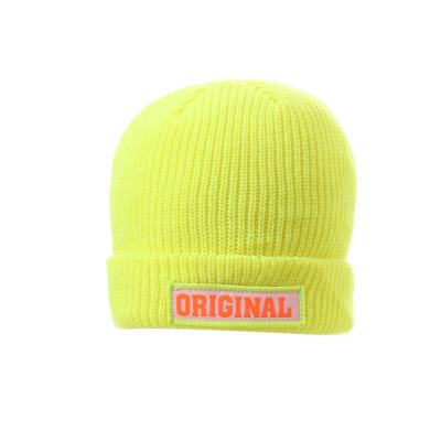 China Fashion JOINT Color Designed Custom Leather Label Knit Hat Winter Beanie 100% Acrylic Men Women Knit Hat Cap Winter Hat for sale
