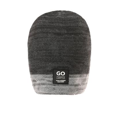 China Custom Winter Logo Woven Label Unisex Acrylic Knitted Beanie Hat for sale