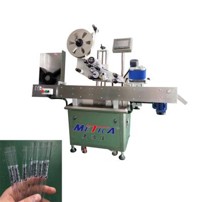 China Automatic horizontal type small round bottle labeling machine for sale